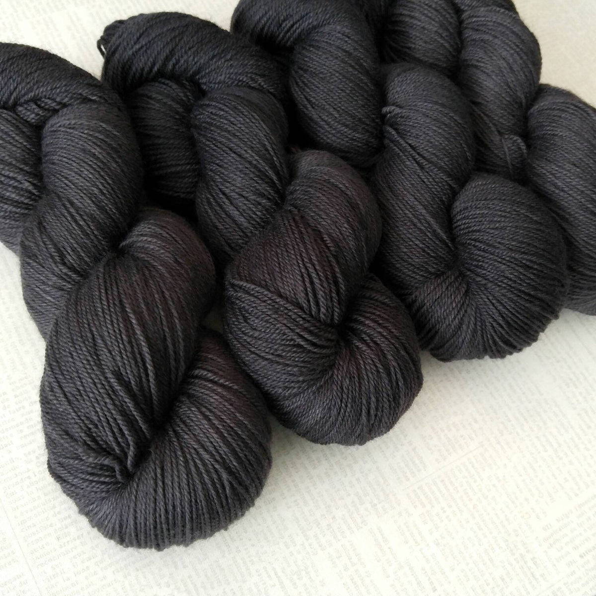 WROUGHT IRON // Hand Dyed Yarn // Tonal Yarn – Midknit Cravings Yarn Co